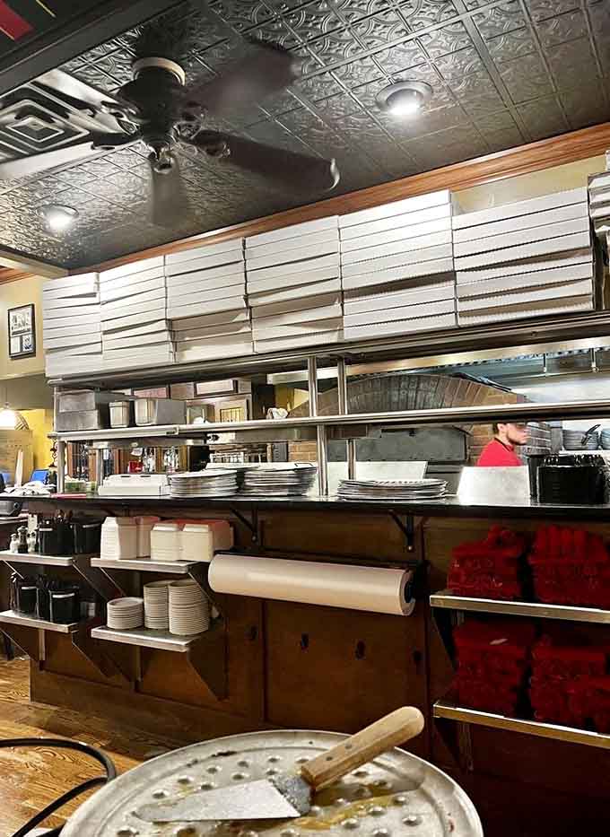 Behind the scenes where pizza magic happens and dreams are assembled one topping at a time.