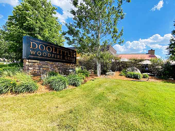 The sign stands proud along the road, a beacon for hungry travelers and locals alike seeking their next memorable meal experience.
