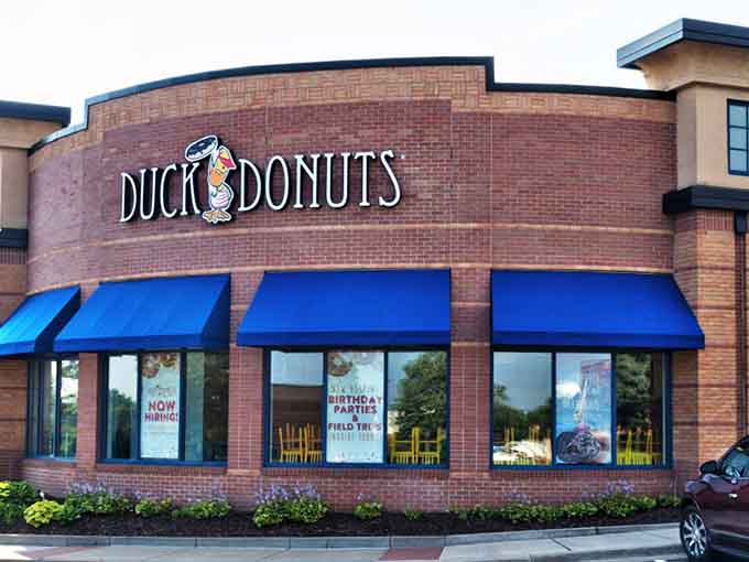 Those blue awnings beckon like flags marking the location of buried treasure, except it's donuts.