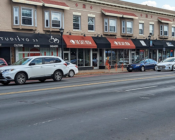 The storefront blends seamlessly into Lexington Avenue, giving no hint of the purr-filled paradise waiting inside.