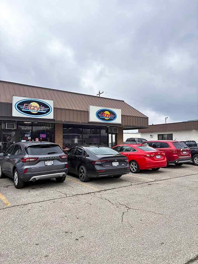 Where hunger journeys begin and diet plans end. Each parking space has witnessed countless pre-meal anticipation and post-meal food comas.
