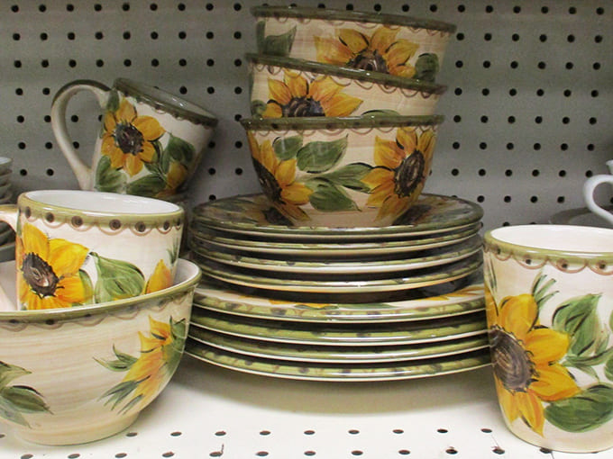 Sunflower-patterned dinnerware blooms on the shelf, practically begging to host your next summer brunch or family gathering.