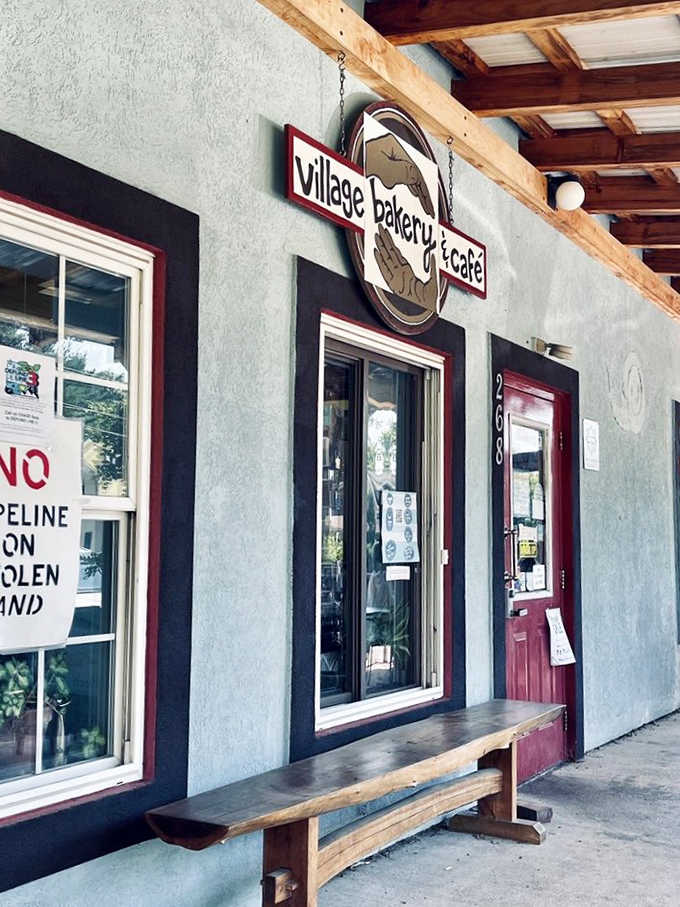 That Village Bakery & Caf&eacute; sign isn't just announcing a business &ndash; it's signaling a destination where food becomes an experience worth traveling for.
