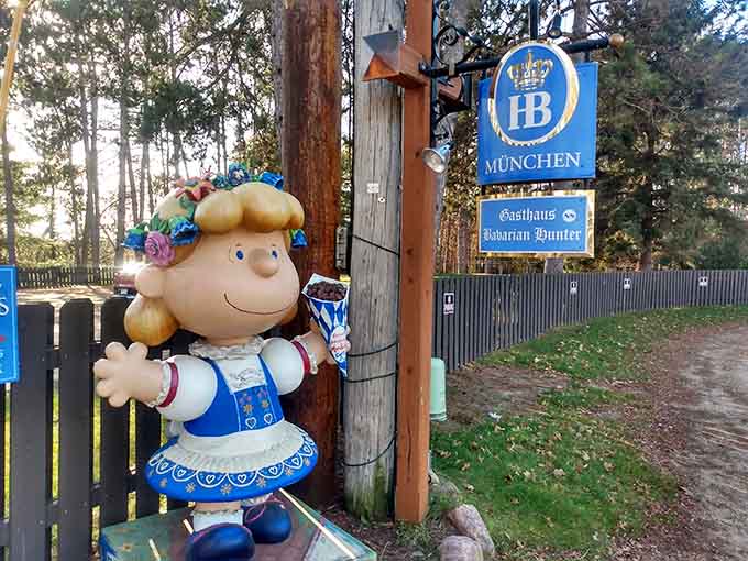 That cheerful Bavarian welcome figure and HB Munchen sign let you know you've arrived at something special before you even walk in.