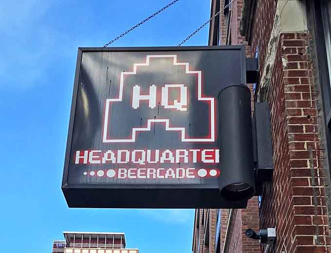 By day or night, that pixelated logo announces you've found the place where grown-ups come to play and nobody judges your Pac-Man skills.