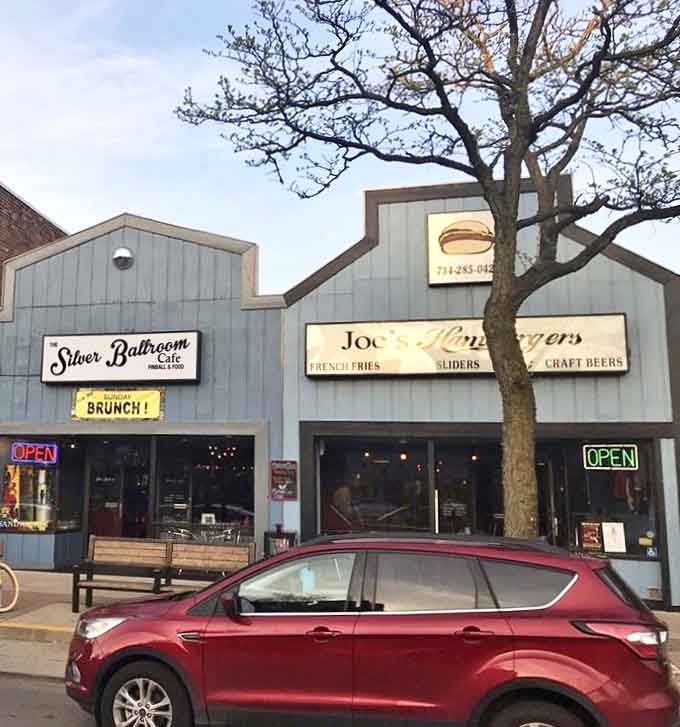 The storefront promises hamburgers and arcade fun, two things that pair together better than most people realize until they try it.