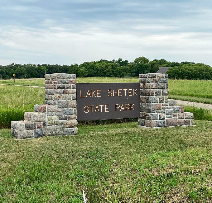 The park entrance welcomes visitors to 1,109 acres of Minnesota beauty, where adventure and relaxation await in equal measure.