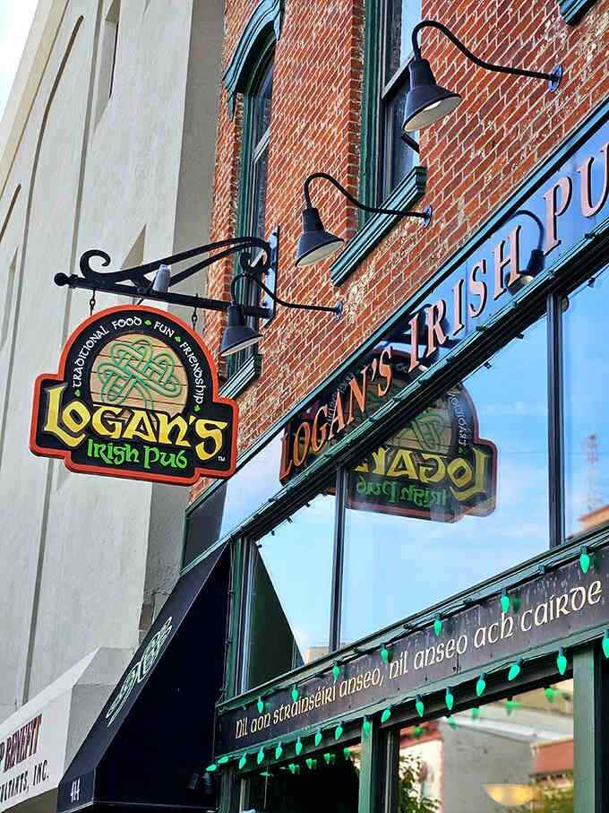 The Celtic-knotted logo announces "Traditional Food, Fun, Friendship" &ndash; three promises that Logan's delivers on with every pint and plate.