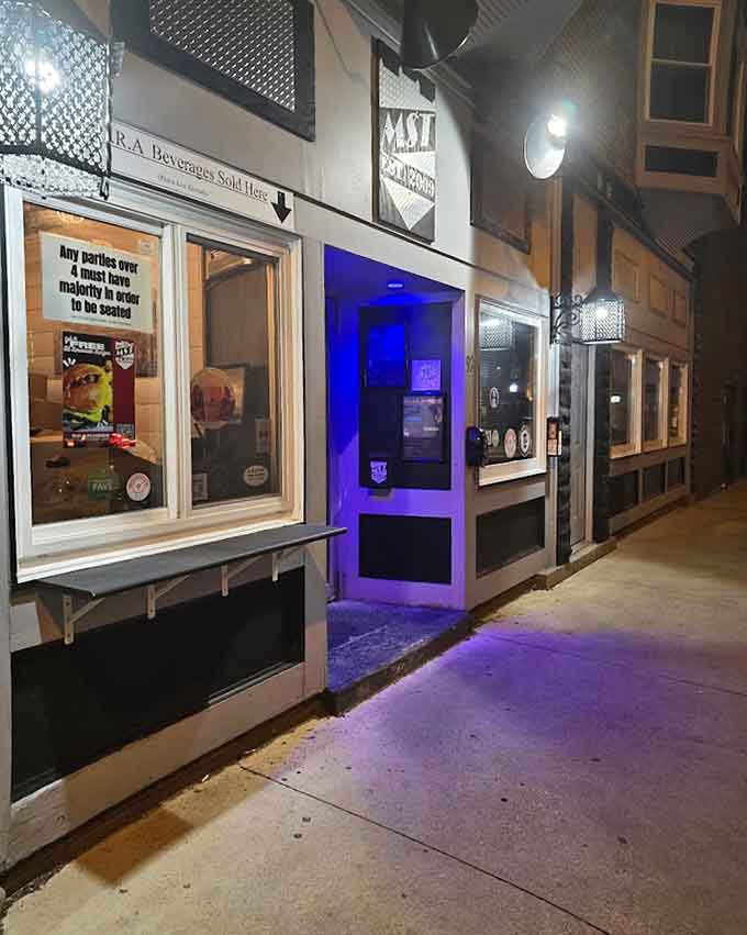 The exterior glows with promise after dark, beckoning hungry souls toward chicken chunk salvation and sauce-covered bliss.