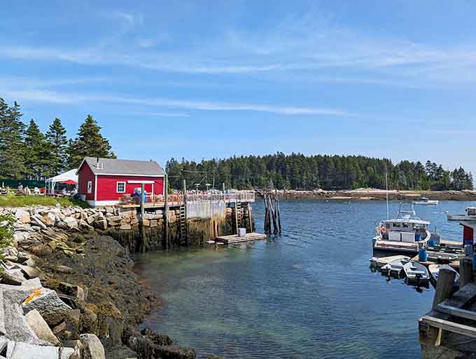 The whole setup&mdash;red shack, working harbor, boats bobbing nearby&mdash;is quintessential Maine at its most charming and delicious.