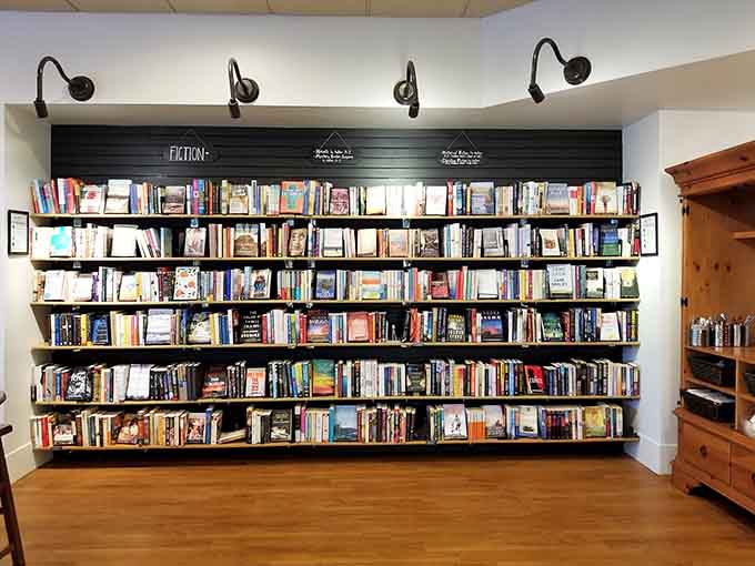 Floor-to-ceiling bookshelves invite browsing and discovery, turning a simple lunch stop into an opportunity to find your next great read too.