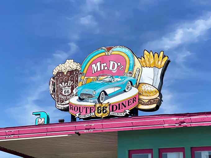 Mr D'z announces itself boldly to Route 66, a colorful beacon promising food worth stopping for every single time.