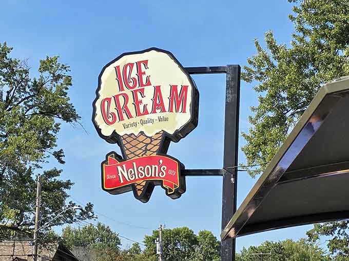The Nelson's sign stands as a beacon of hope for ice cream lovers, promising portions that will exceed expectations and possibly defy gravity.