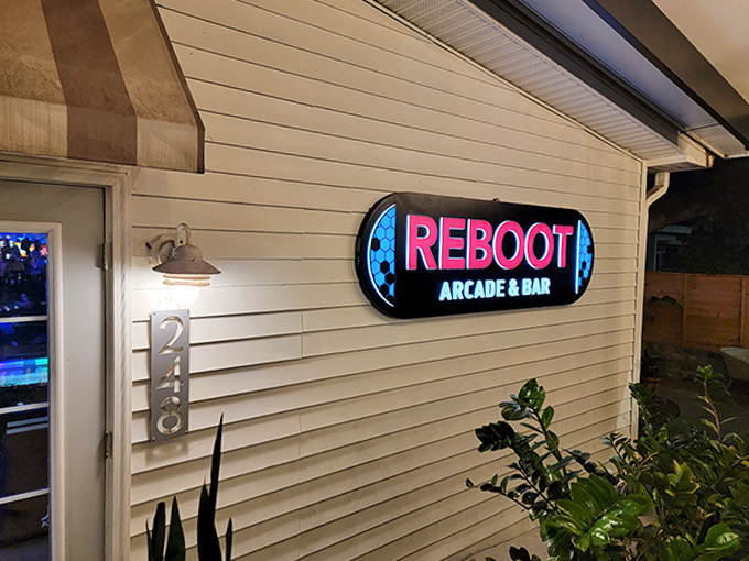 The neon sign serves as a lighthouse for grown-up gamers, beckoning them home to a place where adulthood and childhood joyfully collide.