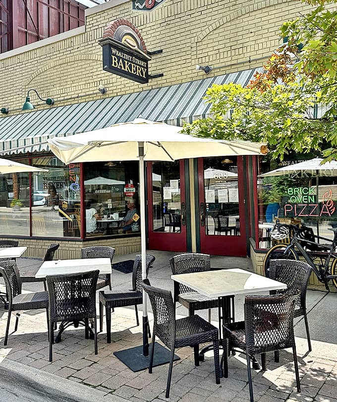 A charming spot where colorful chairs invite you to savor your treasures while watching the world go by.