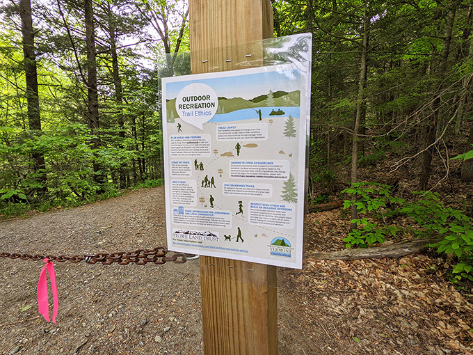 Trailhead signage reminds visitors to explore responsibly, protecting the natural beauty surrounding Bingham Falls.