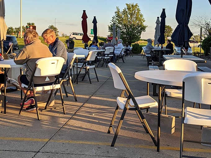 Summer evenings on Busy Corner's patio – where simple outdoor dining becomes magical under Illinois skies.