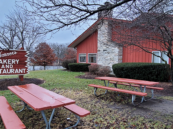 Red picnic tables outside &ndash; for when you need fresh air between donuts or when your pants feel mysteriously tighter.