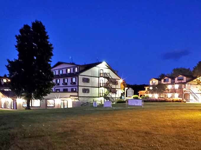 Evening settles over the resort like a cozy blanket, transforming the property into something that belongs on a holiday card.