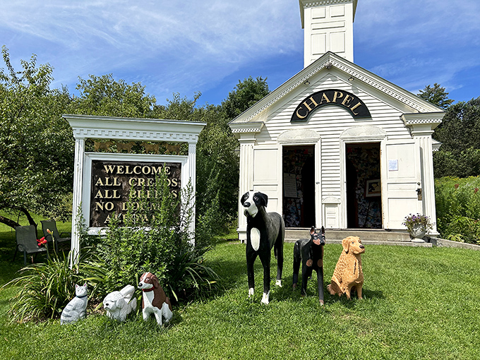 Dog statues of various breeds stand sentinel outside the chapel, greeting visitors with the same enthusiasm as their living counterparts who frolic on the grounds.