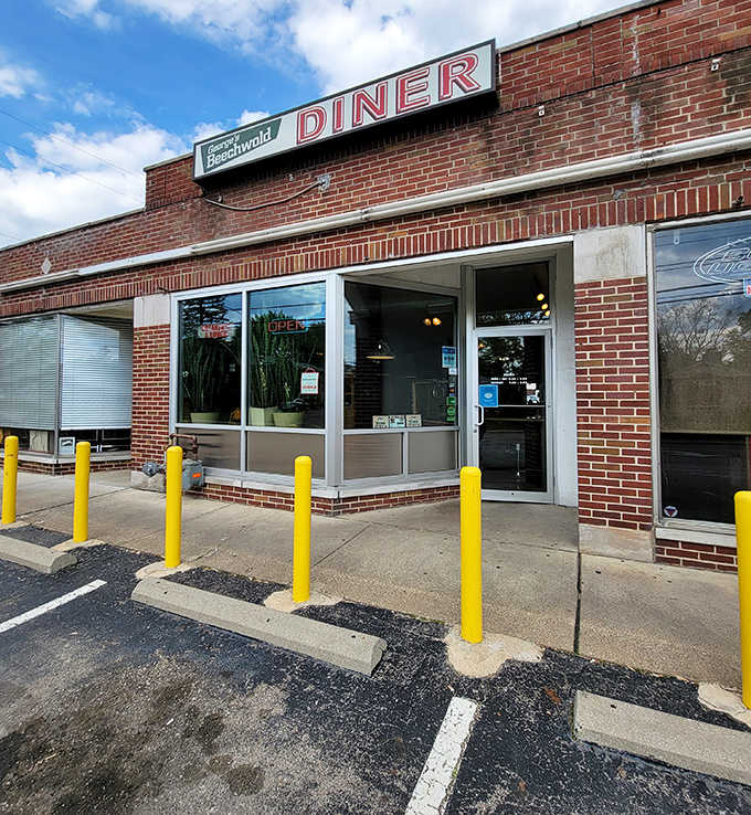 Morning light bathes the brick exterior in golden warmth, as if the building itself is as welcoming as the breakfast waiting inside this Columbus institution.