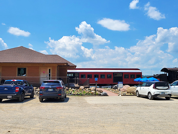 The diner's exterior promises a unique experience, with the converted train car sitting proudly beside its more conventional building.