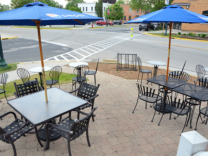 Colorful seating nook where locals share gossip and visitors plan their return trips before they've even left.