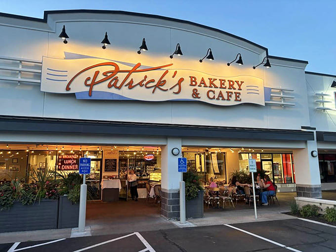 Evening light hits the storefront just right, beckoning you inside where butter, eggs, and flour have formed a delicious conspiracy.
