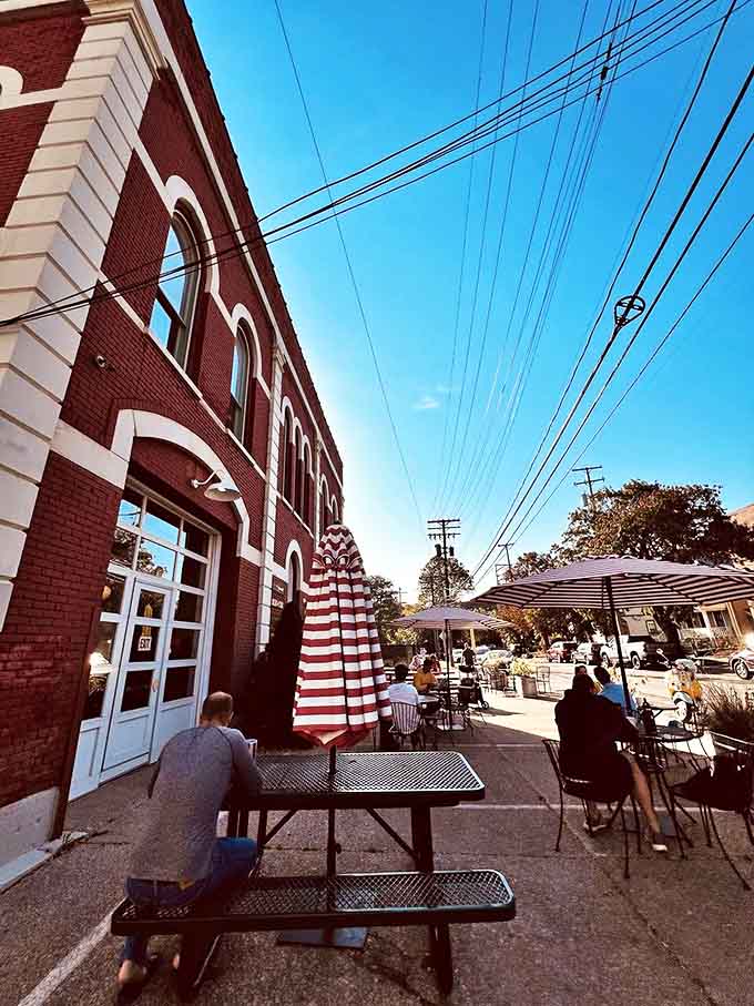 Sidewalk seating under blue skies offers urban tranquility &ndash; the perfect spot to watch Cleveland life unfold between sips of exceptional coffee.