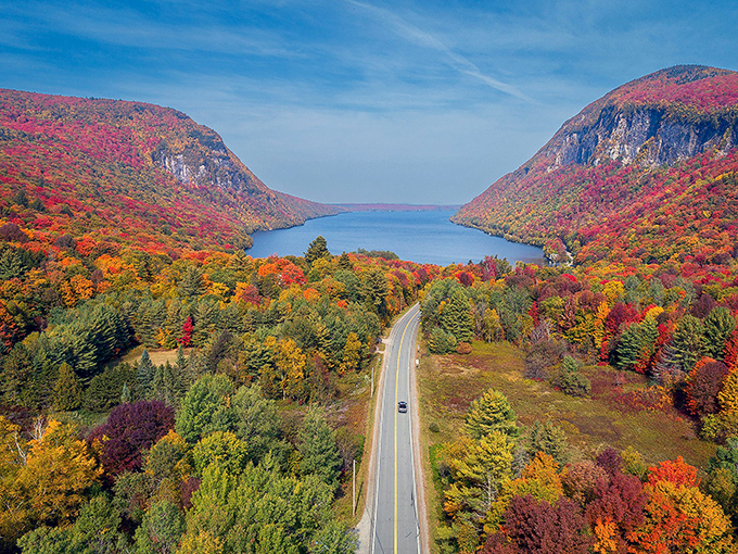 The road to Willoughby during peak foliage &ndash; when driving becomes a journey through nature's most vibrant art gallery.