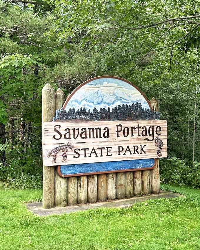 The wooden welcome sign that signals your transition from "regular world" to "woodland wonderland" is complete.