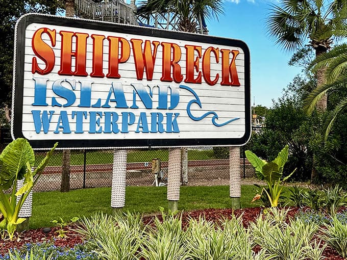 The sign says it all: Shipwreck Island Waterpark, where Panama City Beach visitors trade dry clothes for wet memories since... well, for quite some time!
