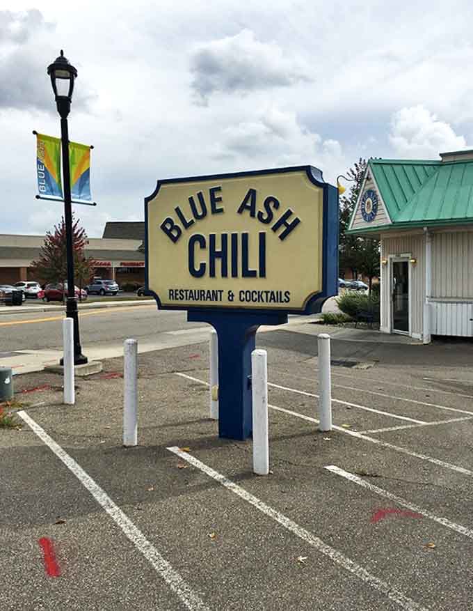 The iconic Blue Ash Chili sign stands as a beacon of hope for the hungry, promising satisfaction just steps away.