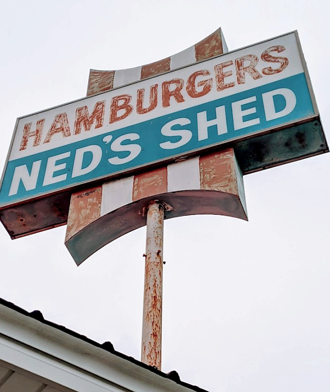 That vintage sign has weathered decades of Illinois seasons, standing as a testament to staying power in a world of fleeting food trends.