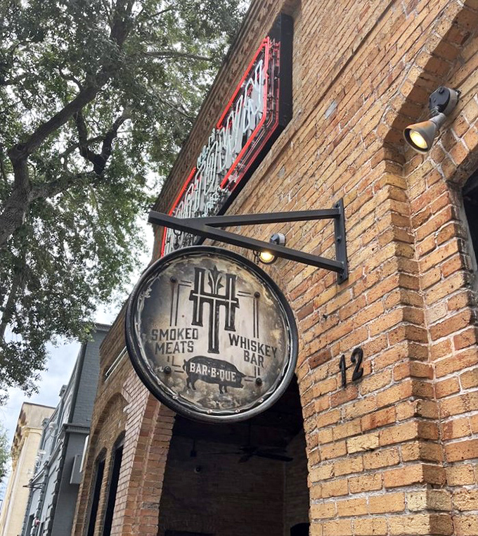 More than just a restaurant name—it's a beacon for the barbecue-obsessed, promising smoked meats and whiskey in equal measure.