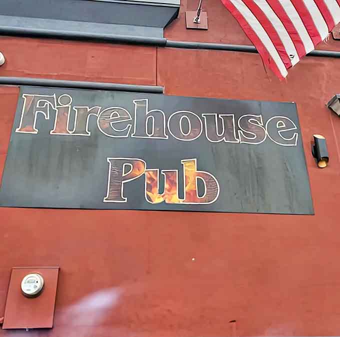 The Firehouse Pub sign glows with promise – a beacon for those seeking exceptional pizza and warm hospitality in St. Clair Shores.