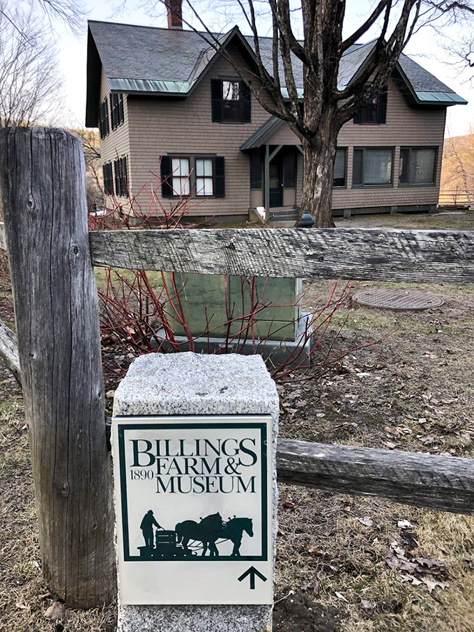 The unassuming entrance sign that marks the threshold between modern chaos and agricultural serenity, promising authentic experiences that no theme park could replicate.