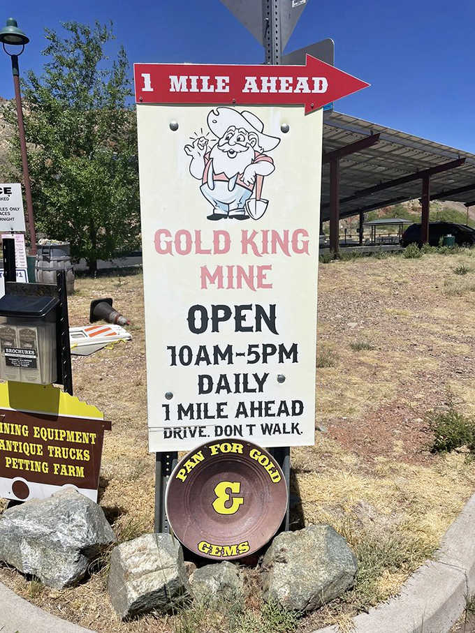 A cheerful cartoon miner points the way to Gold King Mine, open daily from 10-5 &ndash; with sage advice to drive rather than walk.