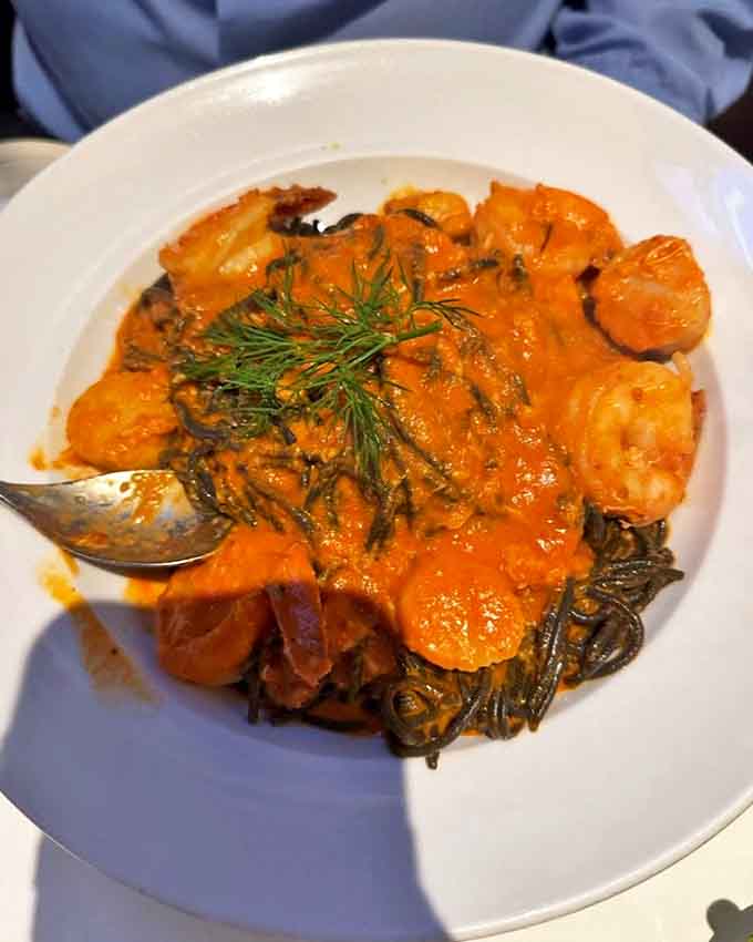 This seafood pasta dish showcases the kitchen's commitment to generous portions and bold, beautiful flavors that deliver every time.