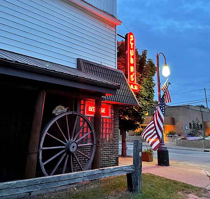As dusk falls, Stubbs Bar's exterior gives just a hint of the wonders waiting inside &ndash; a wagon wheel and American flag setting the Americana tone.