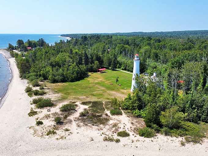 This aerial view reveals how perfectly positioned the lighthouse is on its peninsula. Mother Nature and human engineering in perfect harmony!