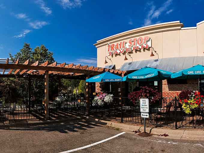 Trail Stop Tavern's exterior promises neighborhood warmth and quality food, standing ready to become your new favorite local gathering spot today.