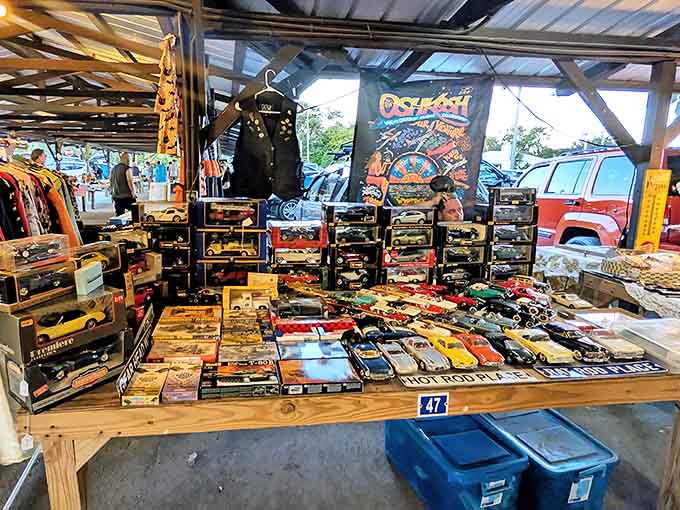 Miniature automotive history lines this table, where collectors debate the finer points of die-cast details with the passion of full-size car enthusiasts.