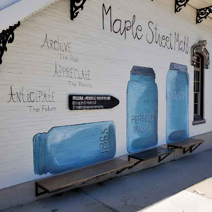 Mason jars painted on the exterior wall aren't just decoration &ndash; they're a visual metaphor for preserving history, one treasure at a time.