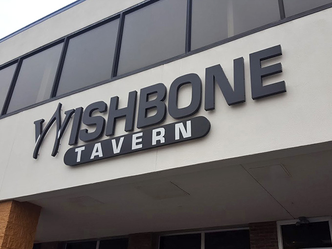 The Wishbone Tavern sign marks the spot where pot roast sandwich dreams come true.