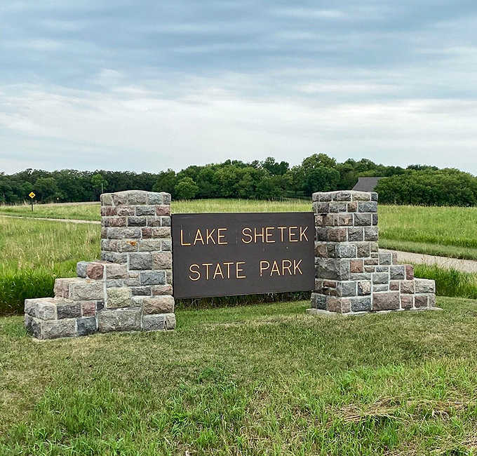 Lake Shetek's stone welcome sign&mdash;the gateway to adventures that won't make your credit card weep.