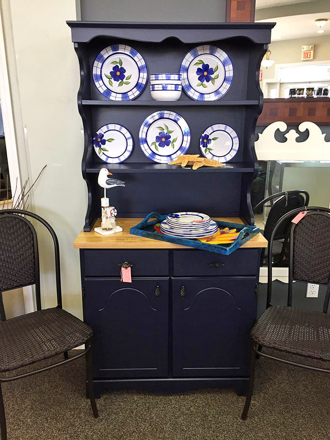 The navy hutch displays dishes with such elegant styling, you'd never guess everything here costs less than a casual dinner out.