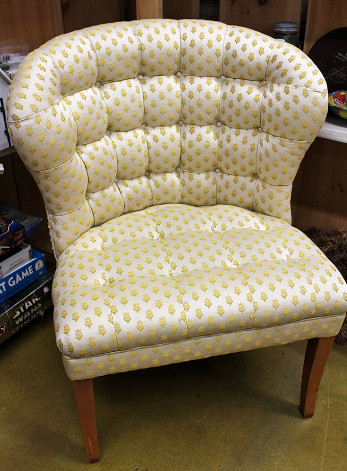 This tufted yellow armchair isn't just furniture—it's a conversation piece waiting to become the favorite reading spot in someone's home.