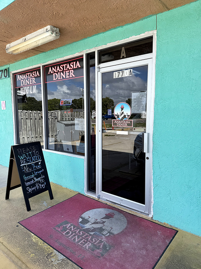 The welcoming entrance with its worn welcome mat tells you everything: this place values substance over style.
