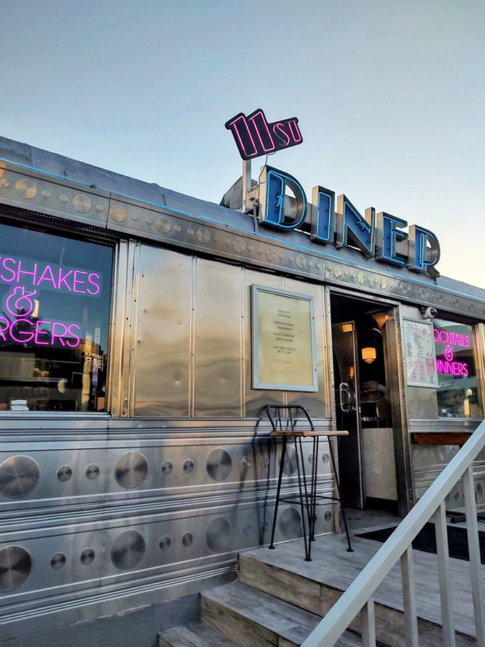 The entrance to 11th Street Diner – those few steps lead to a world where calories don't count and nostalgia is served with a side of fries.